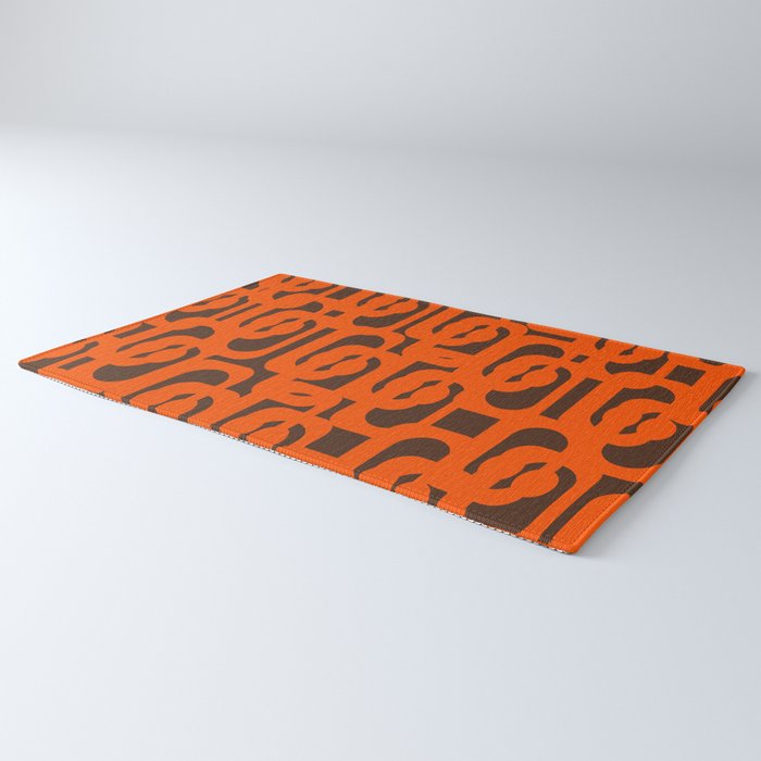 dark orange patterned rug