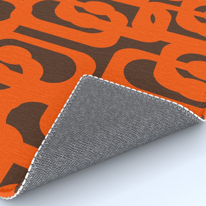 dark orange patterned rug